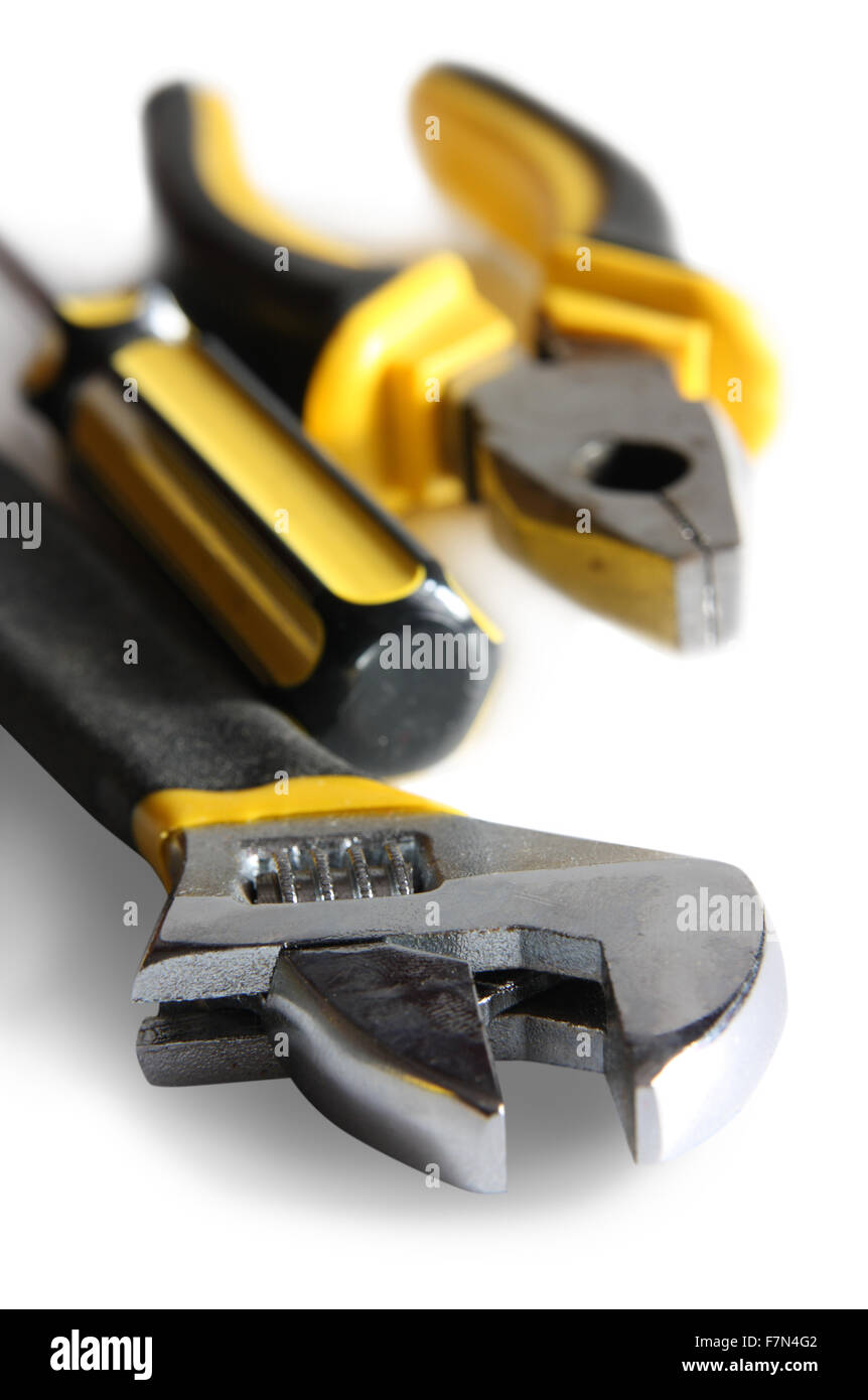 set of yellow tools over white background Stock Photo - Alamy