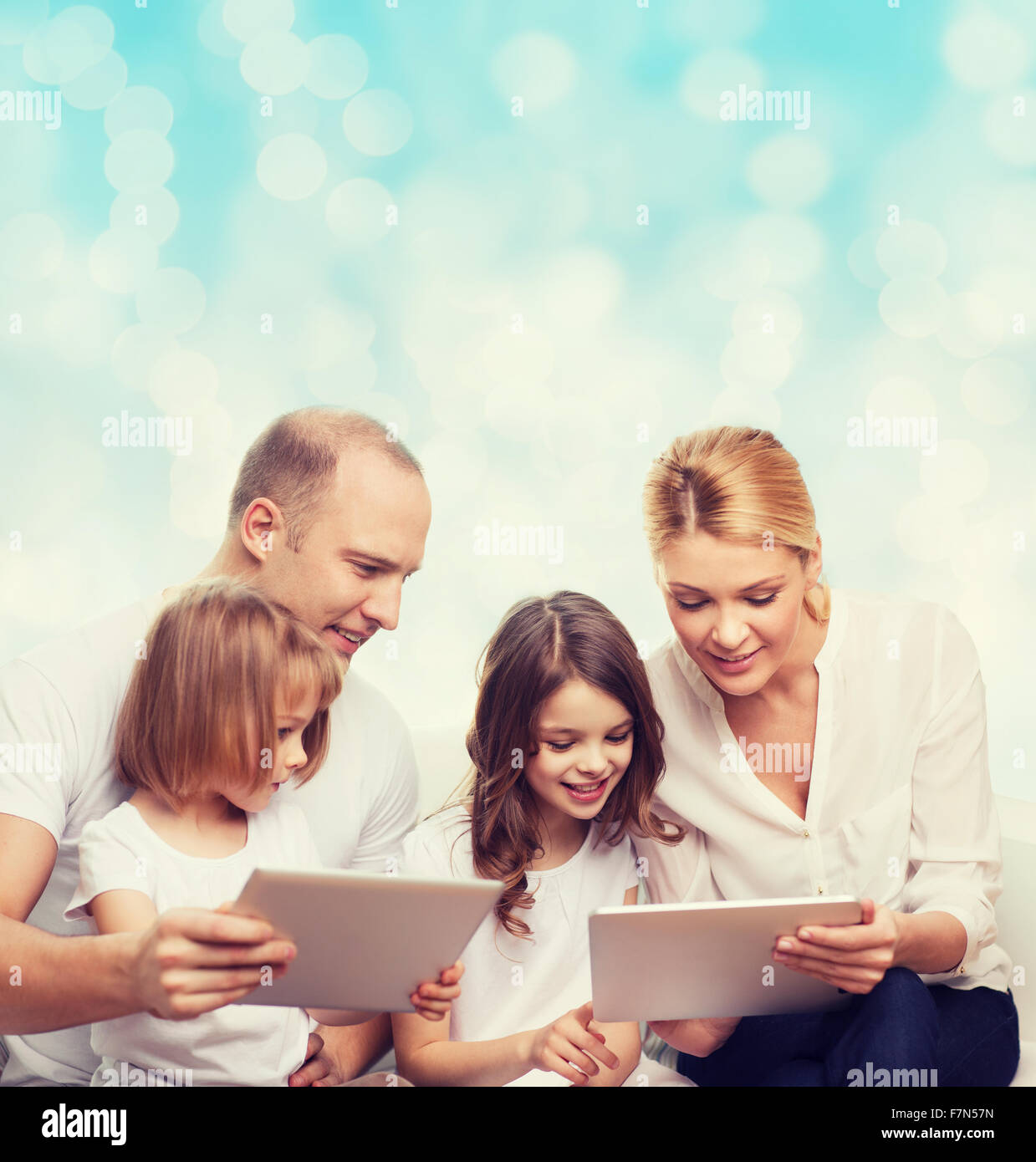 happy family with tablet pc computers Stock Photo - Alamy
