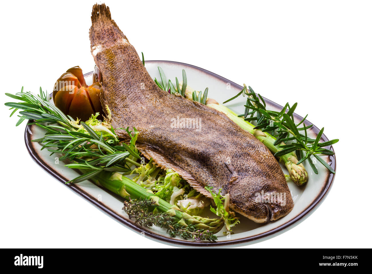 Fish Dover sole roasted Stock Photo - Alamy