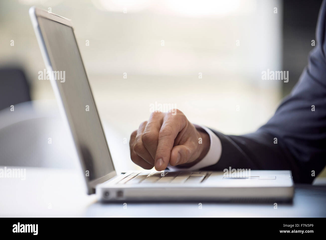 Using laptop computer Stock Photo - Alamy