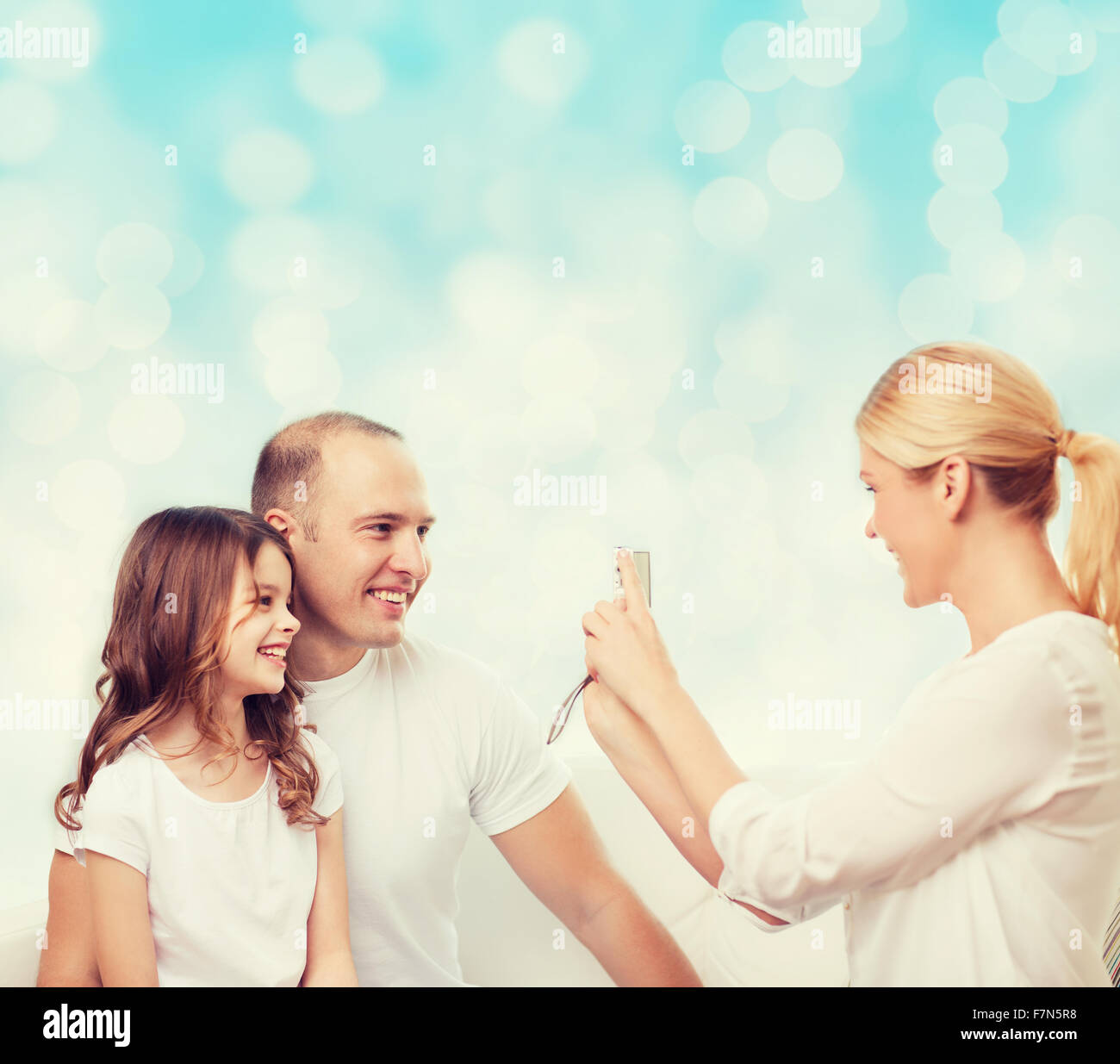 happy family with camera at home Stock Photo - Alamy