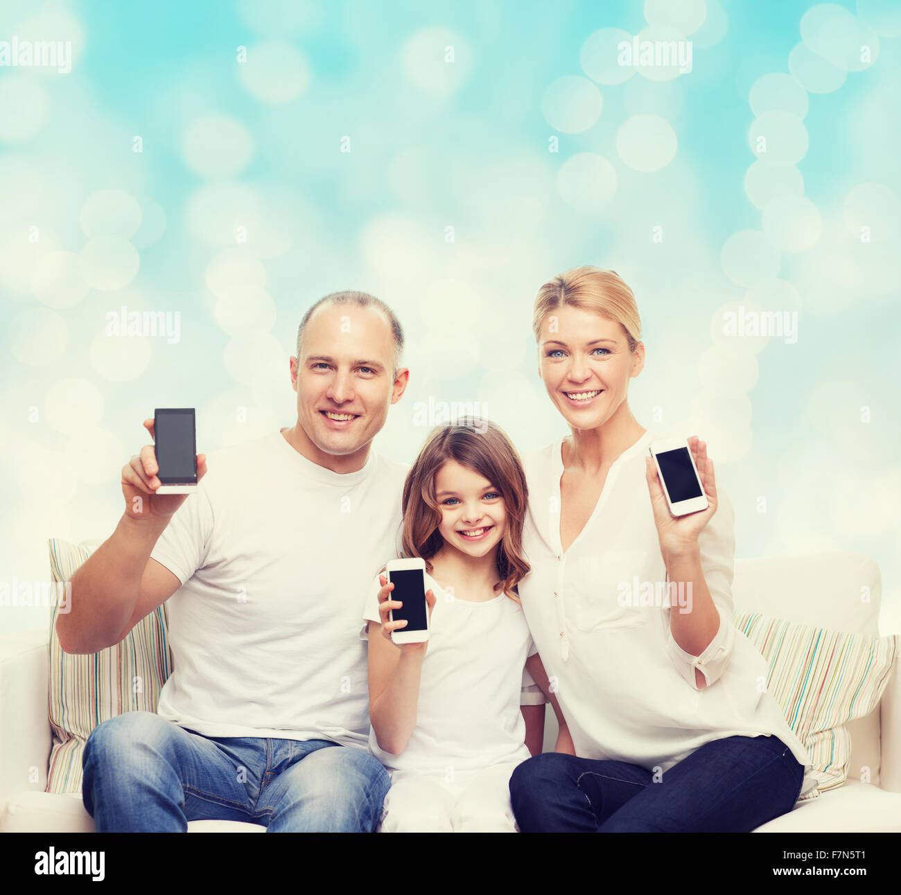 happy family with smartphones Stock Photo - Alamy