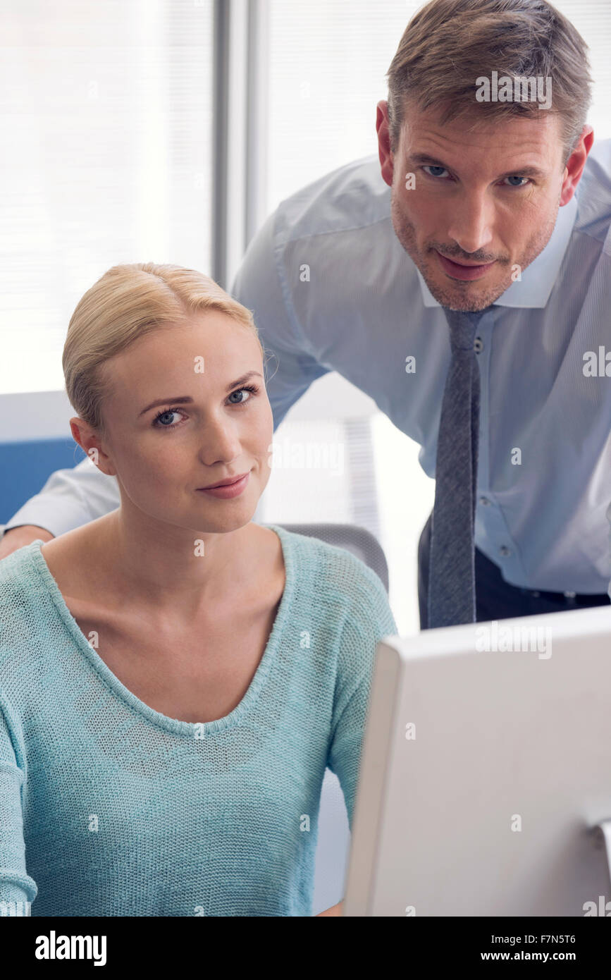 Colleagues collaborating on project, portrait Stock Photo - Alamy