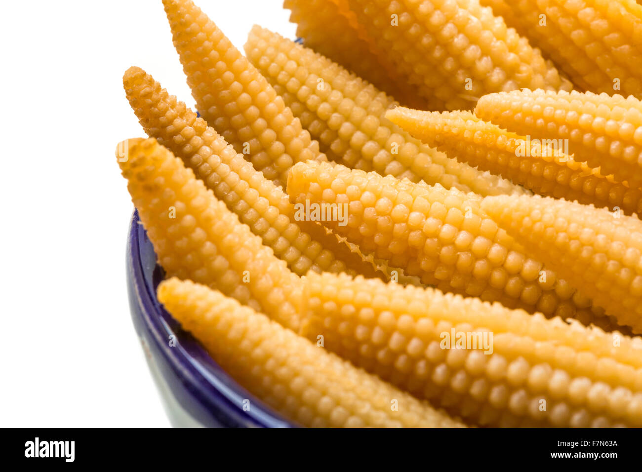 Baby corn isolated Stock Photo - Alamy