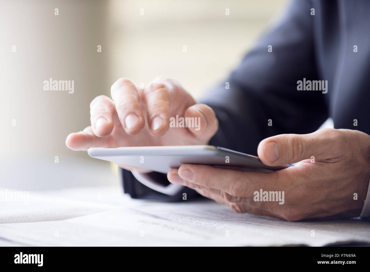Using digital tablet Stock Photo - Alamy