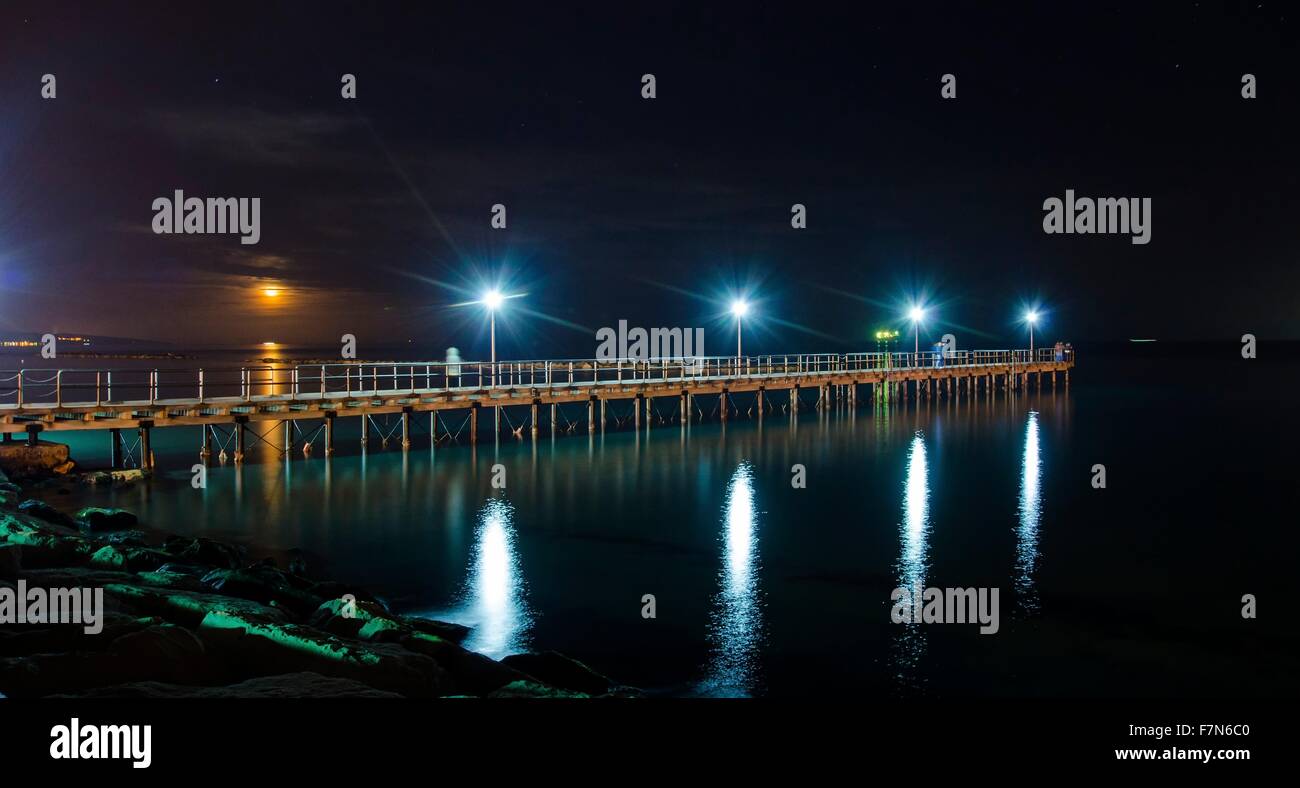The Limassol pier in Enaerios Area in Cyprus. A night view of the city ...