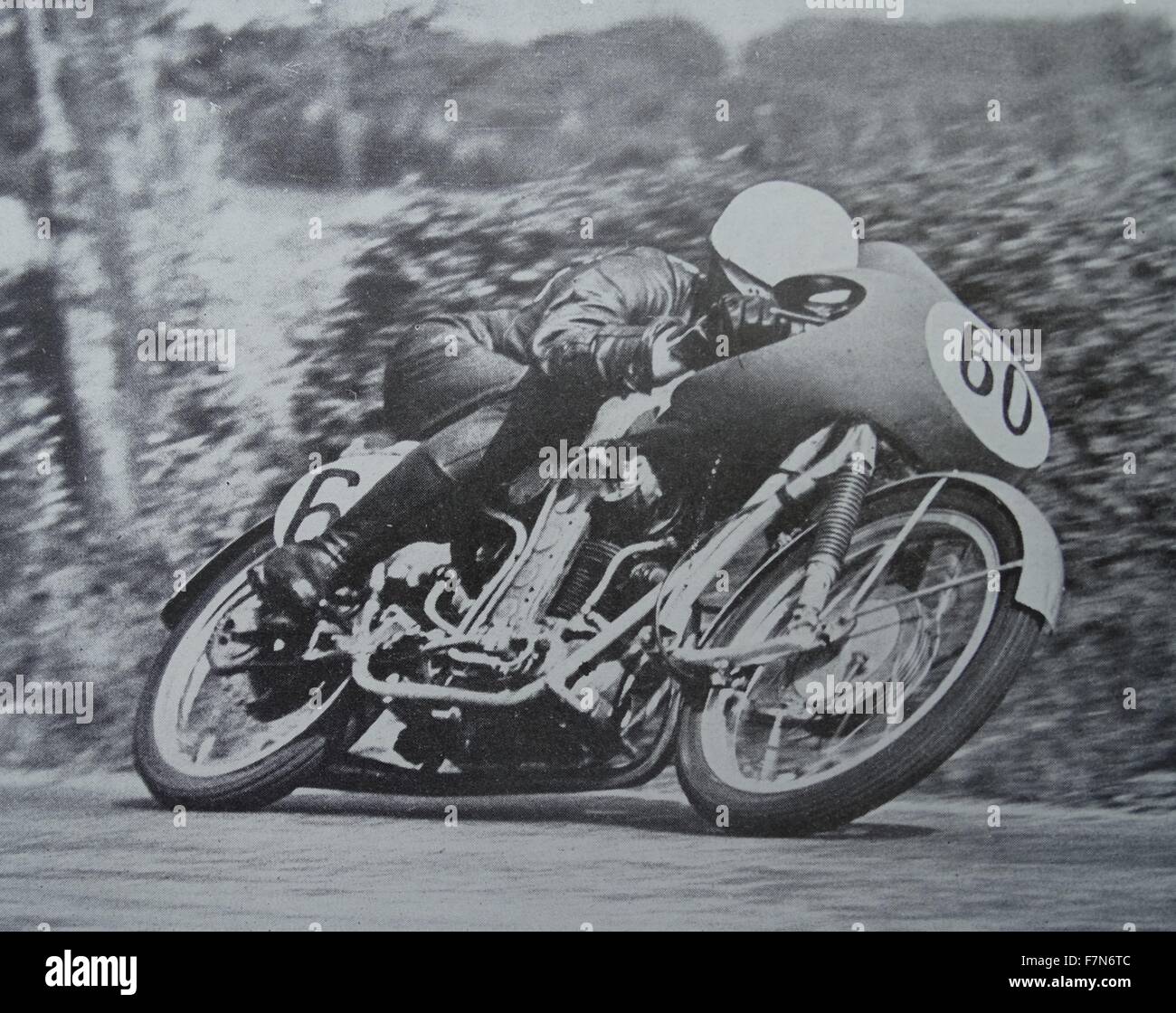 Les Graham in his attempt to capture the 1953 lightweight 125 c.c. race ...