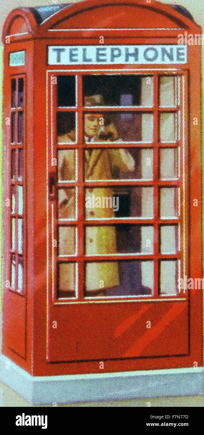 Man making call in a public telephone call in a telephone box 1948 ...