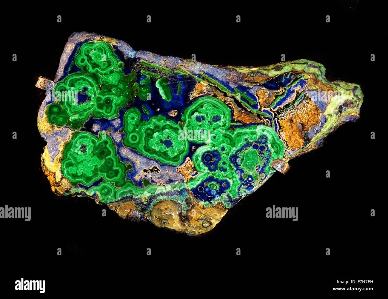 The distinctive green banding of malachite is because of the way the ...