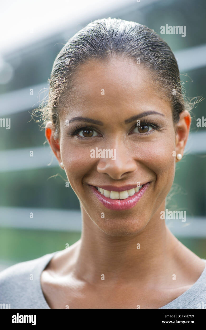 Woman smiling, portrait Stock Photo - Alamy