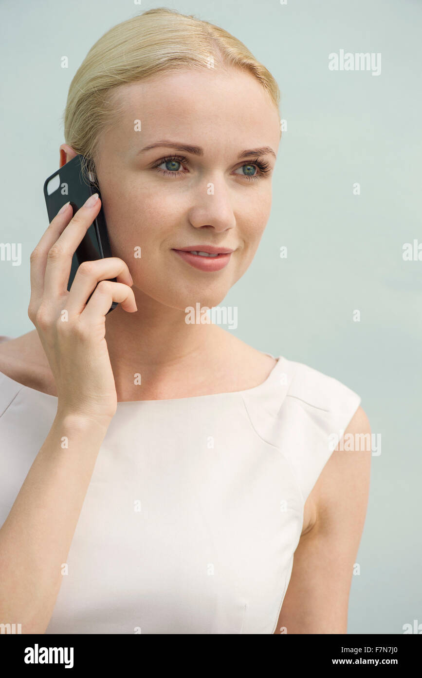 Woman using cell phone Stock Photo - Alamy