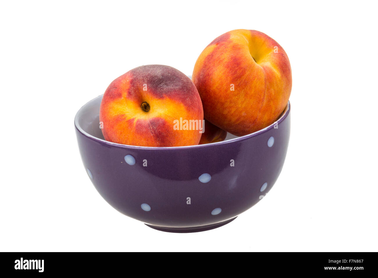 Bright ripe peaches isolated Stock Photo - Alamy