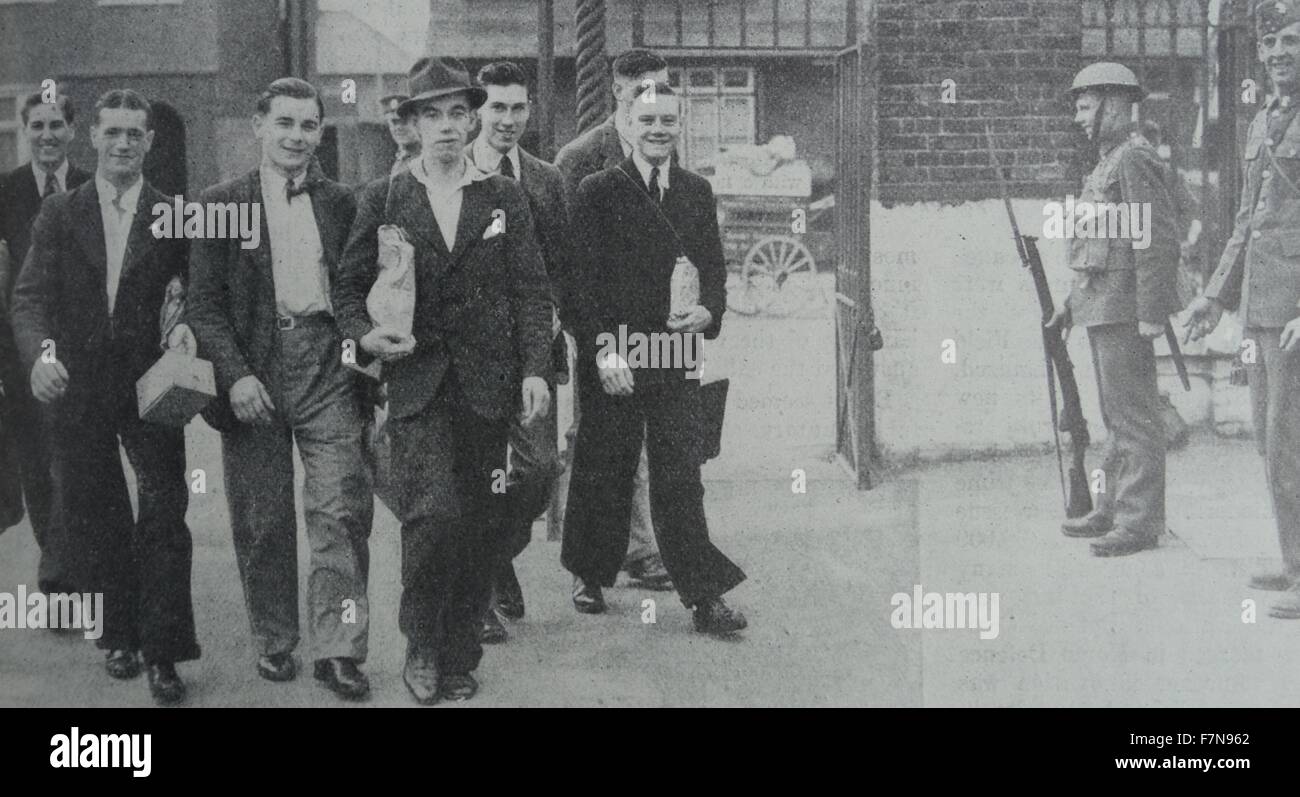 Photograph of the second batch of Militiamen reporting for duty walking ...