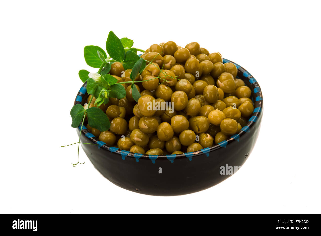 Marinated green peas with branch Stock Photo - Alamy