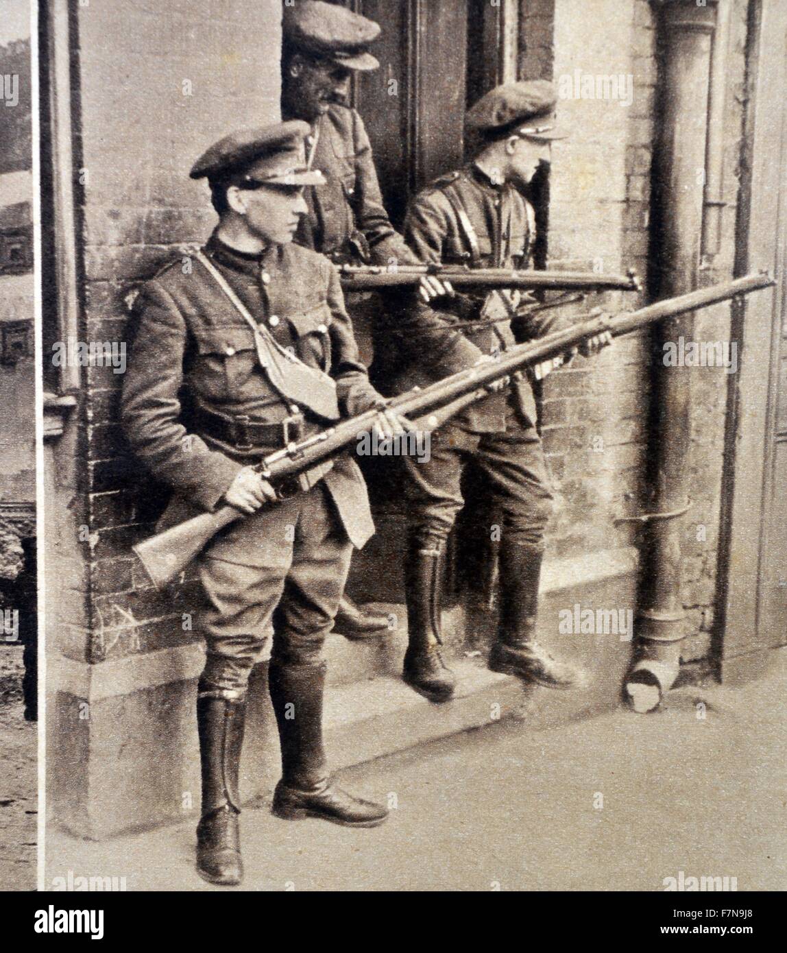 Photograph of armed soldiers guarding the four court after the battle ...