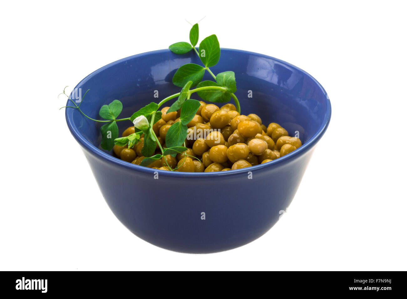 Marinated green peas with branch Stock Photo - Alamy