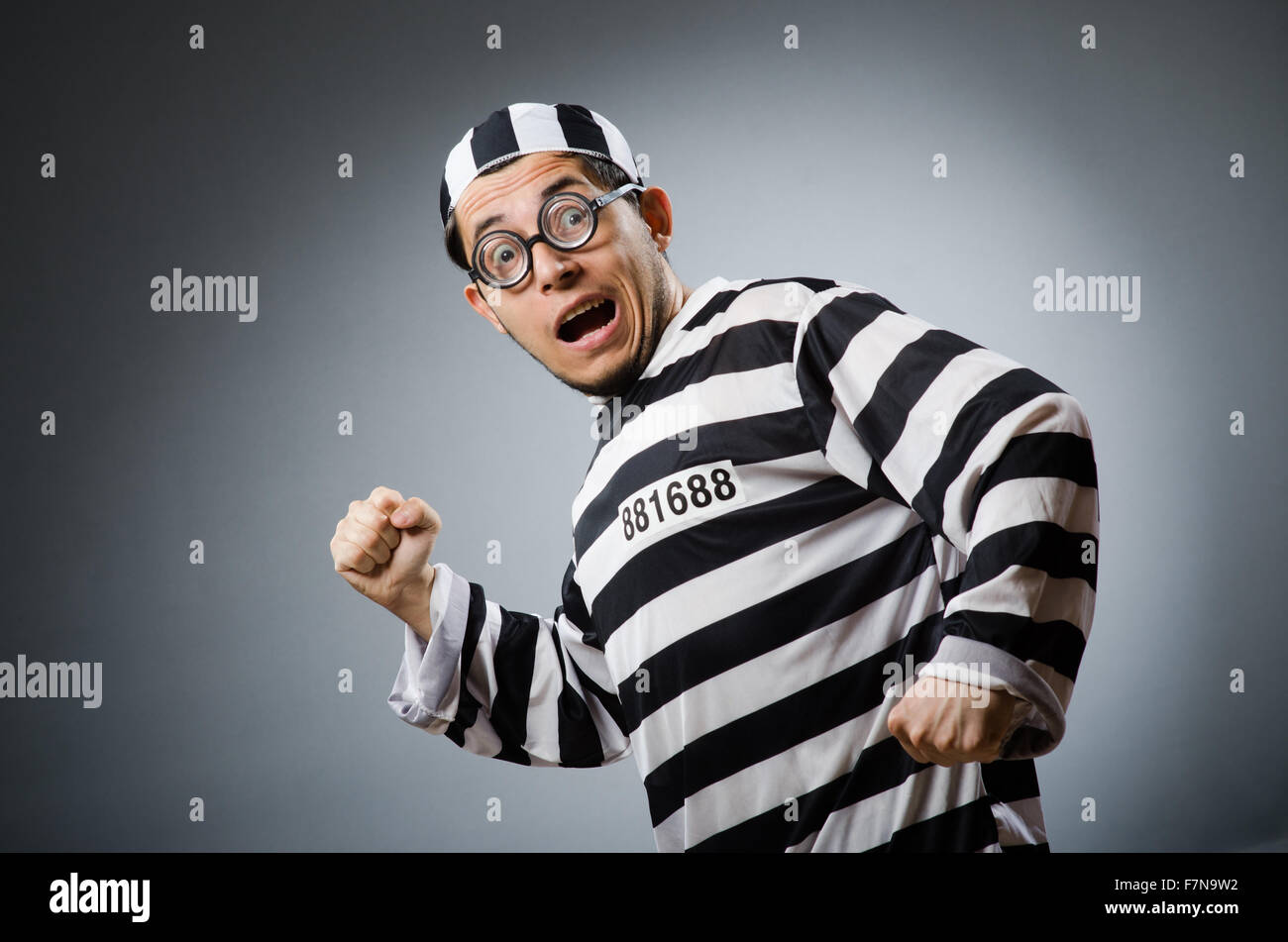 Prison inmate in funny concept Stock Photo - Alamy