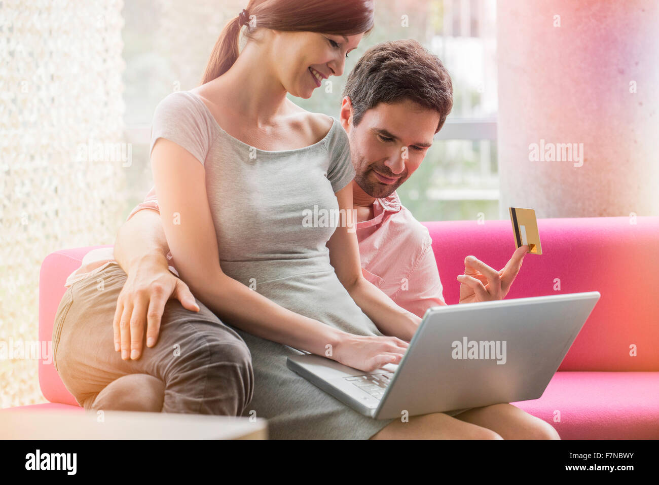 Woman buys computer hi-res stock photography and images - Alamy