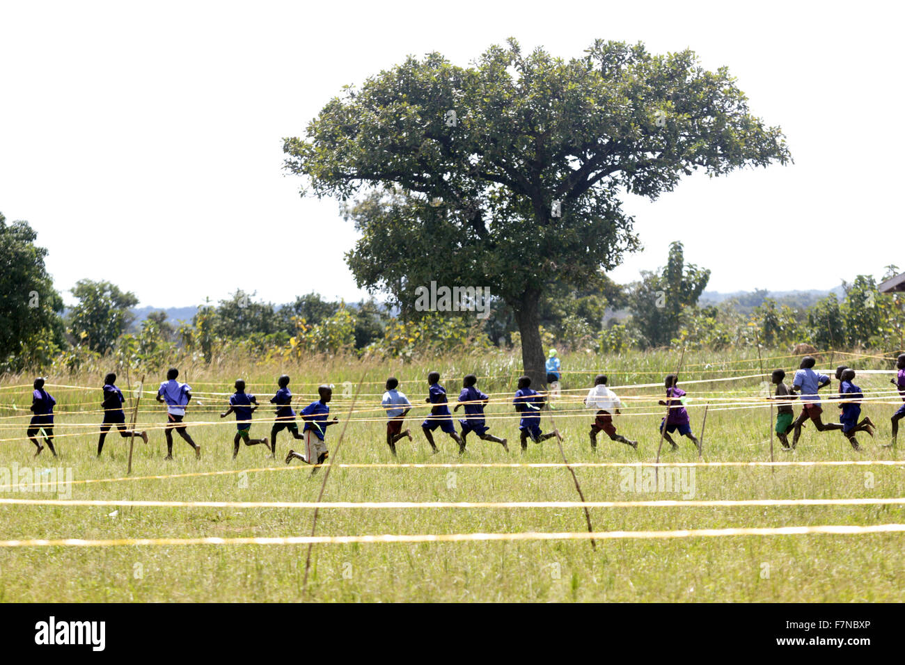 Children taking part in community cross country race in Otuke district ...