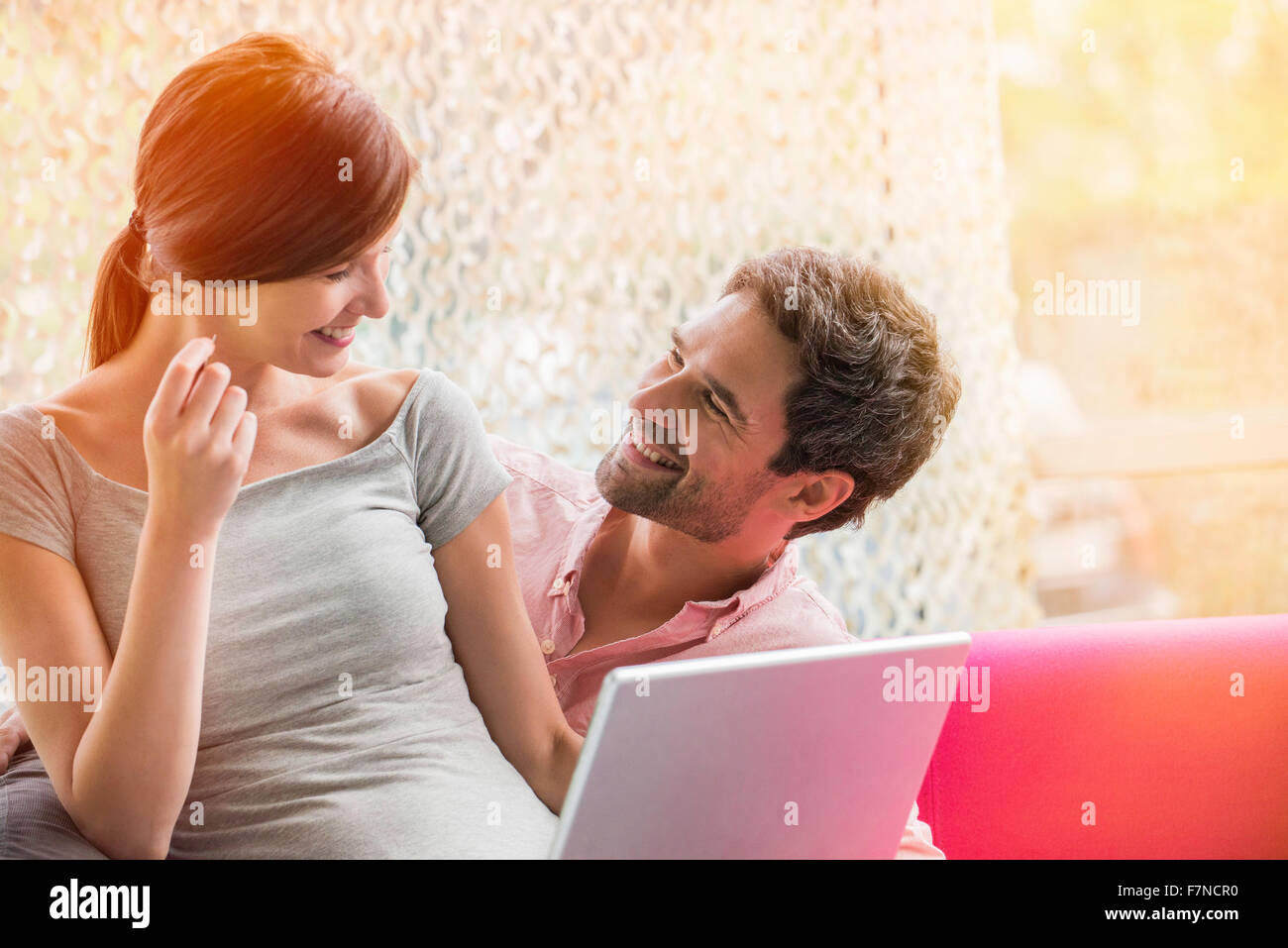 Couple making purchase online with credit card Stock Photo - Alamy
