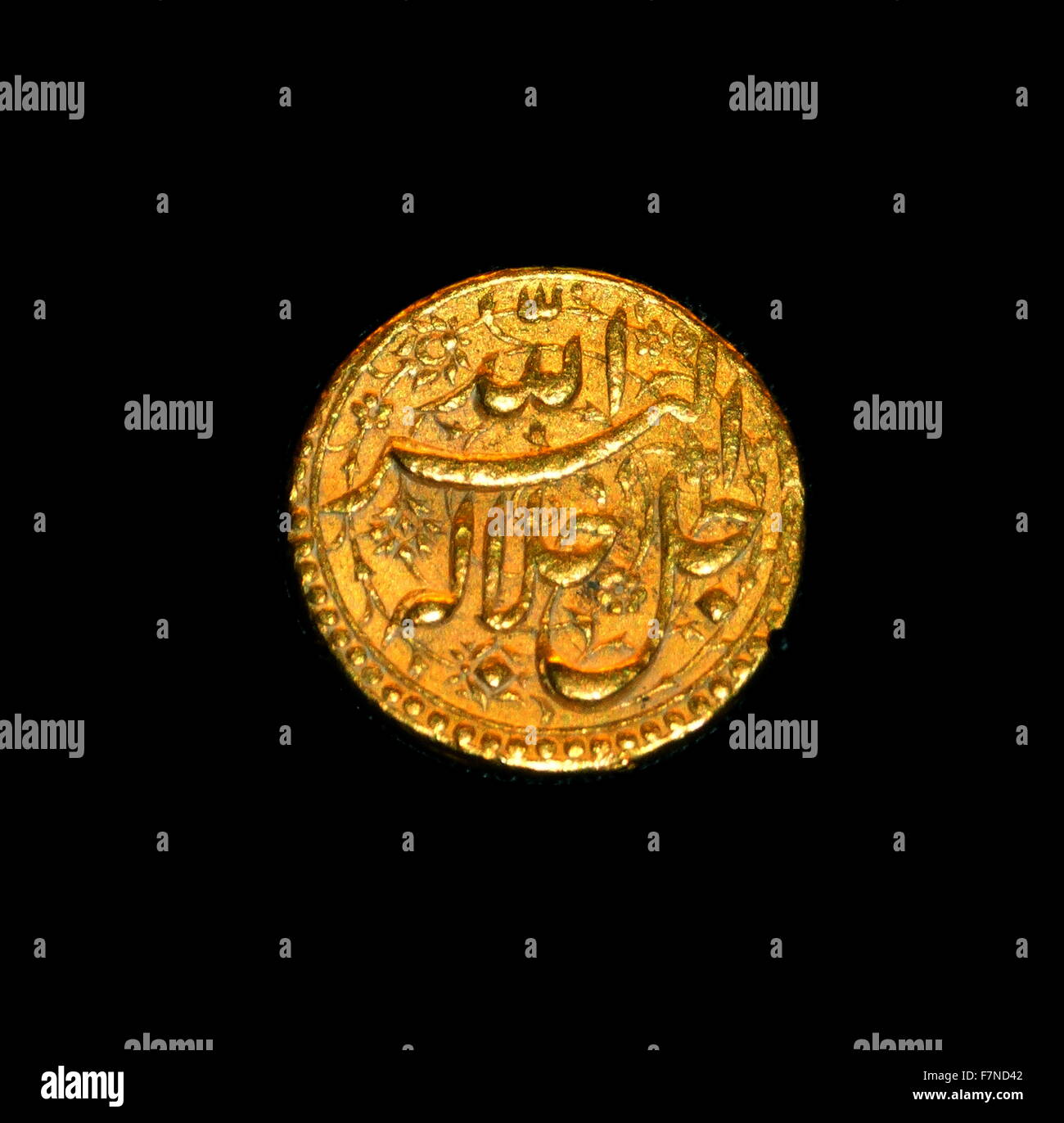 Gold Mughal coin of Emperor Akbar, Agra 1556-1605 This gold coin ...