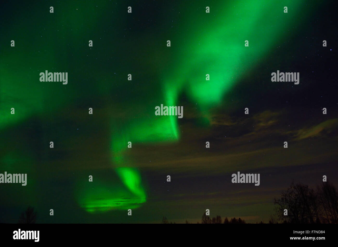 solar flare creates strong vibrant aurora borealis on the winter night ...