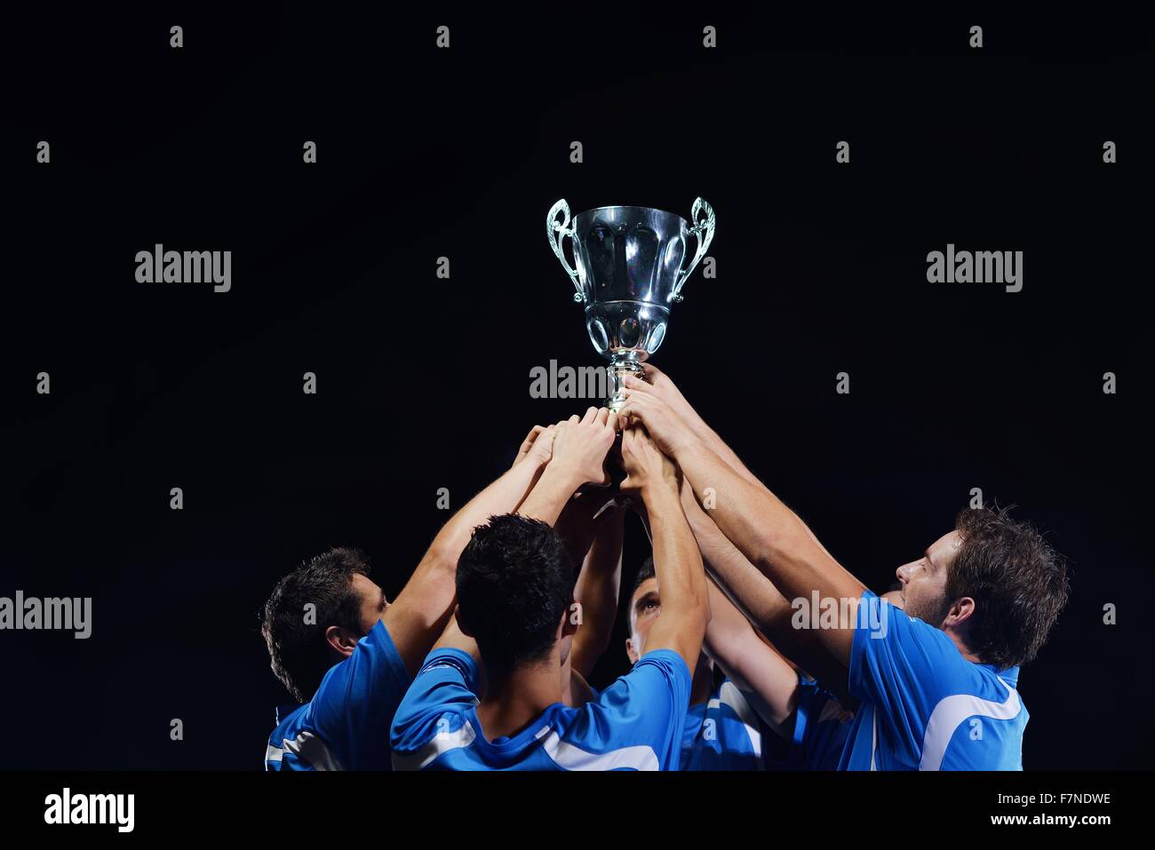 soccer players team group celebrating the victory and become champion ...