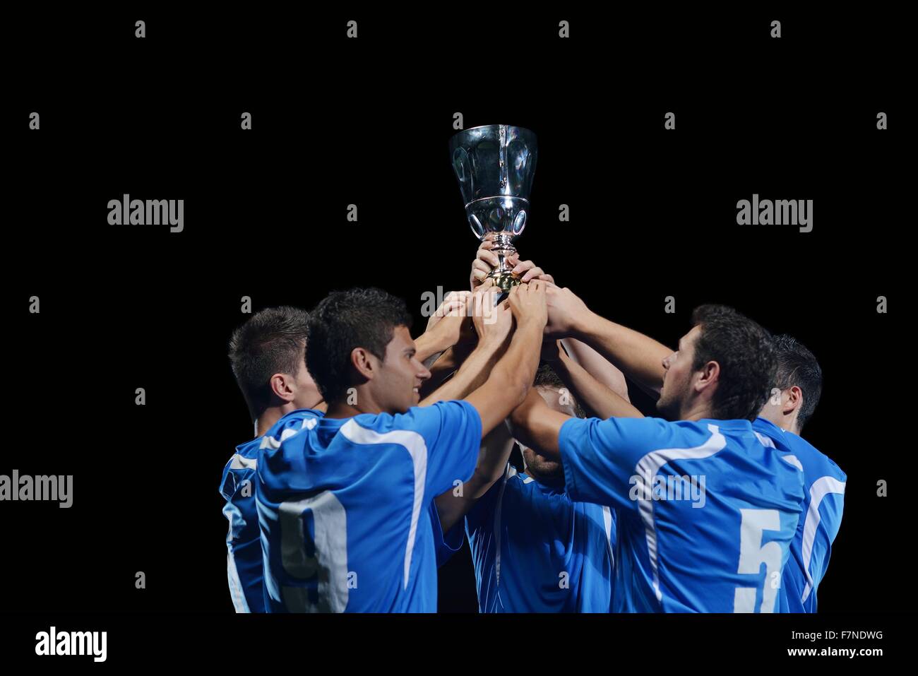 soccer players team group celebrating the victory and become champion ...