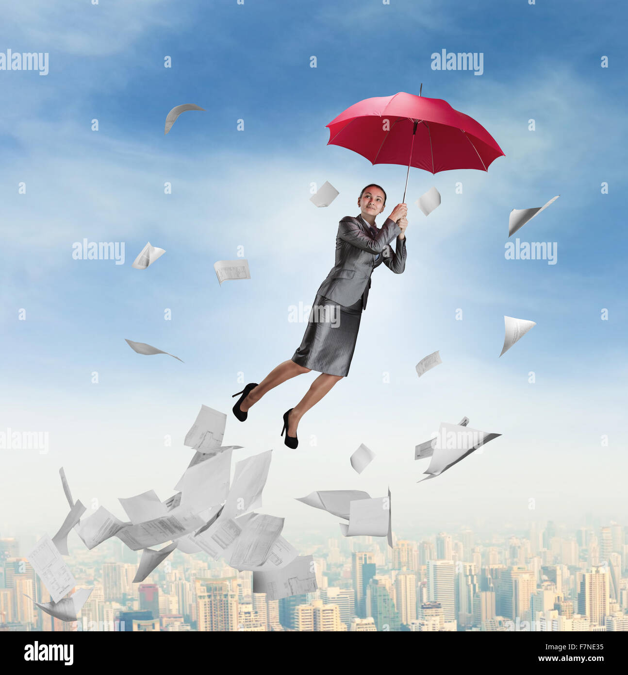 Woman flying with umbrella hi-res stock photography and images - Alamy