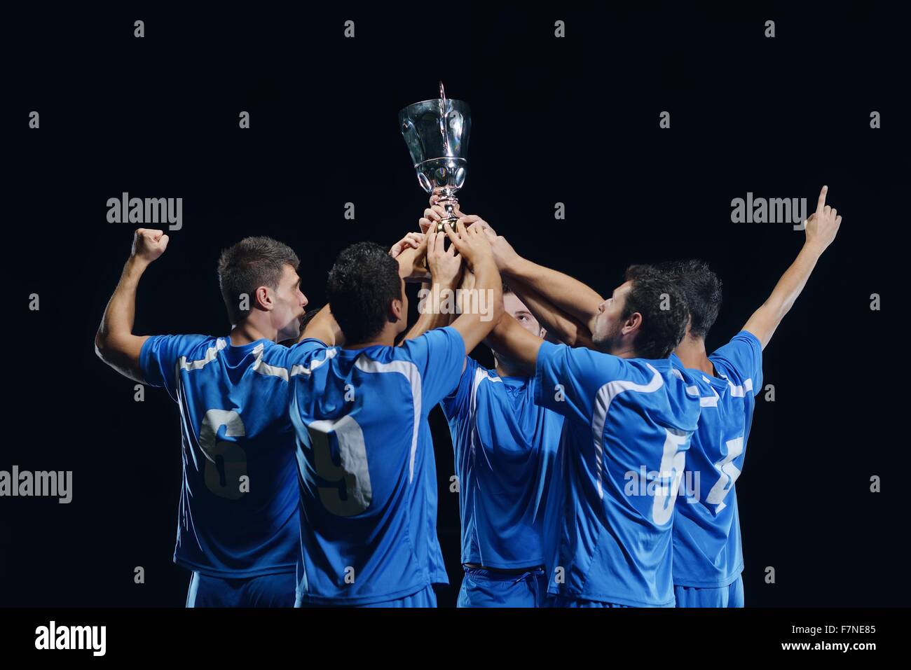 soccer players team group celebrating the victory and become champion ...