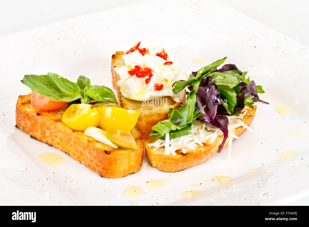 different colored Canapes on a white background Stock Photo - Alamy