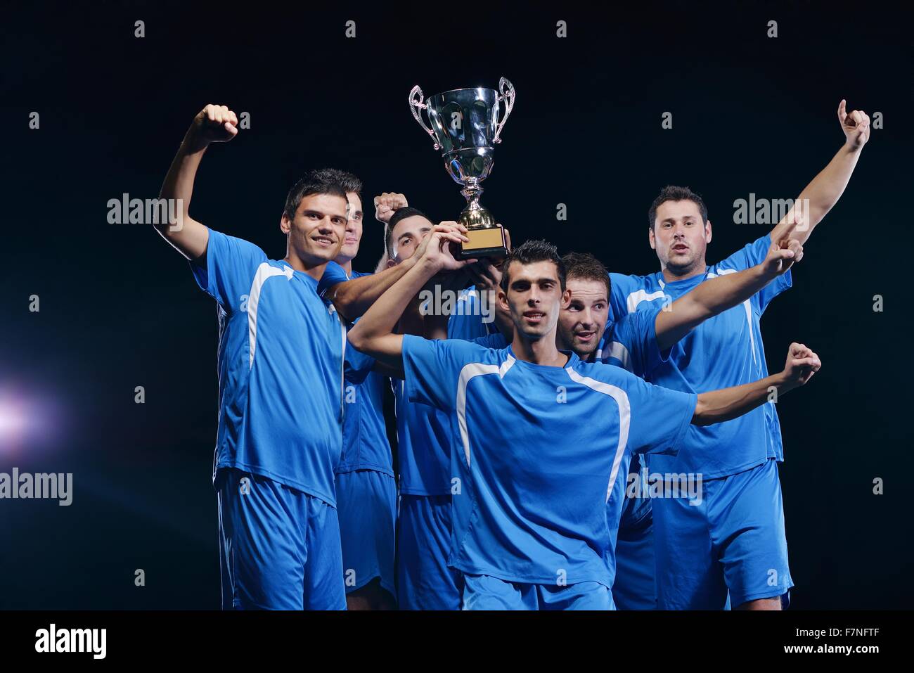 soccer players team group celebrating the victory and become champion ...