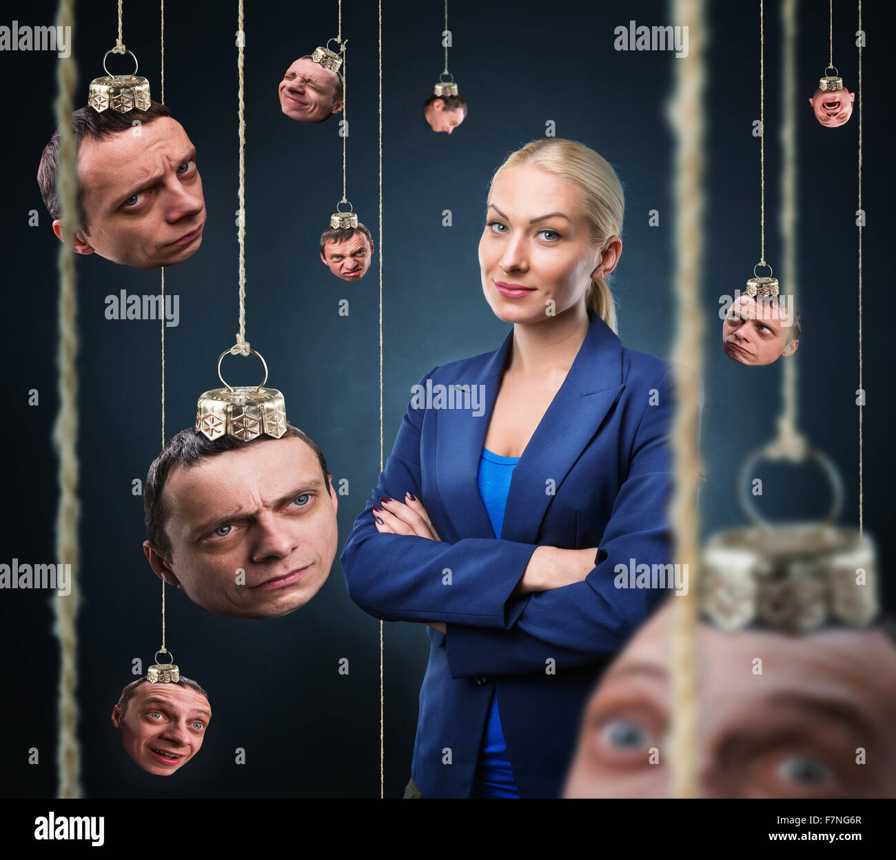 Woman with man's head hanging Stock Photo - Alamy