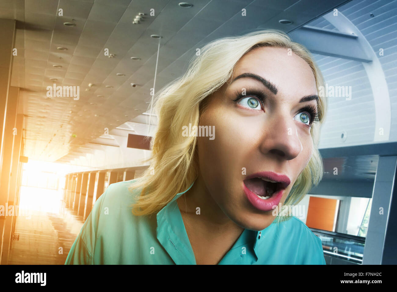 Deeply surprised woman Stock Photo - Alamy