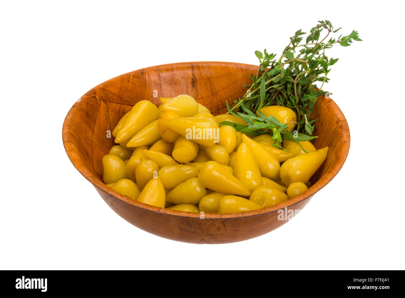 Yellow marinated pepper with thyme Stock Photo - Alamy