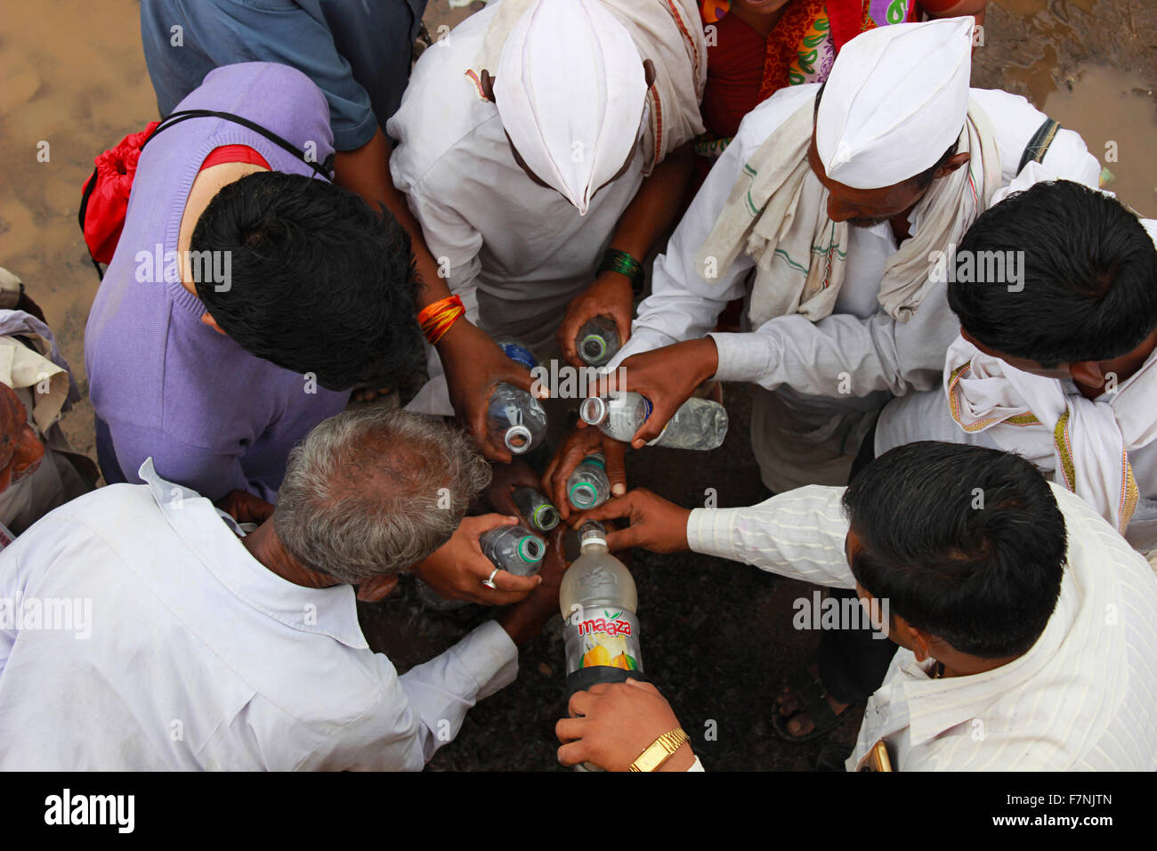 Pilgrims or warkari pouring water. Pandharpur Palkhi, Maharashtra India ...