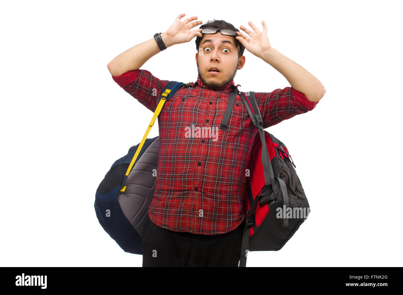 Young man with bags isolated on white Stock Photo - Alamy