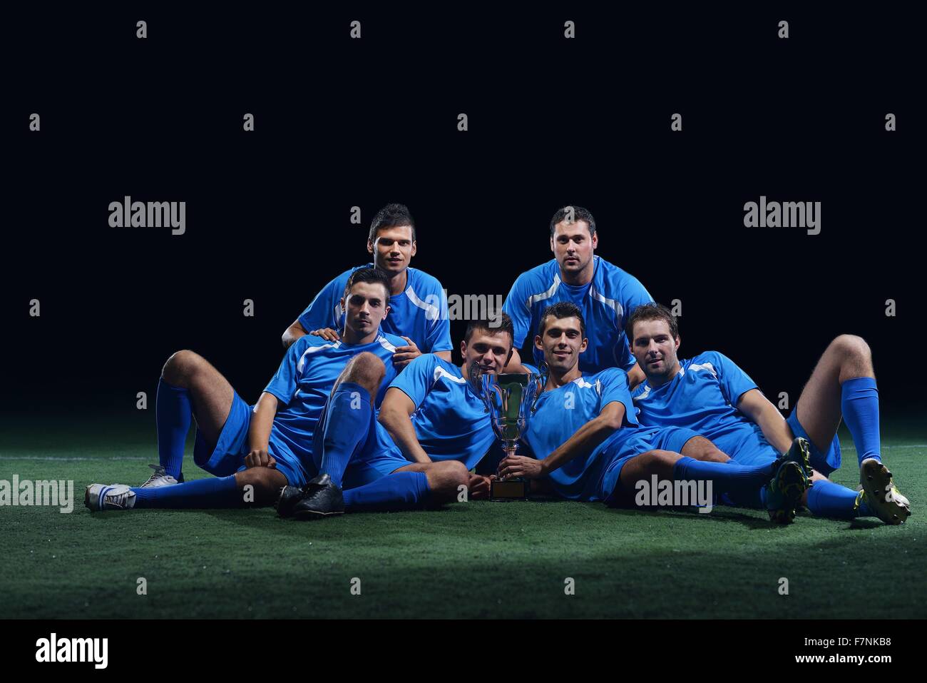 soccer players team group isolated on black background Stock Photo - Alamy