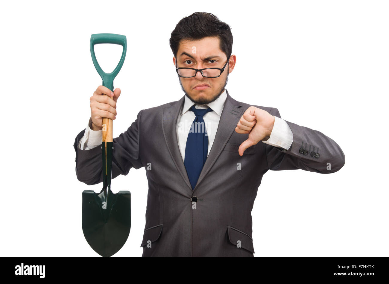 Young businessman holding a spade isolated on white Stock Photo - Alamy