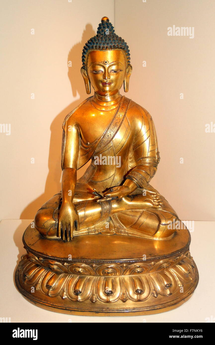 Gold Buddha seated on a lotus throne from Tibet. Dated 19th Century ...