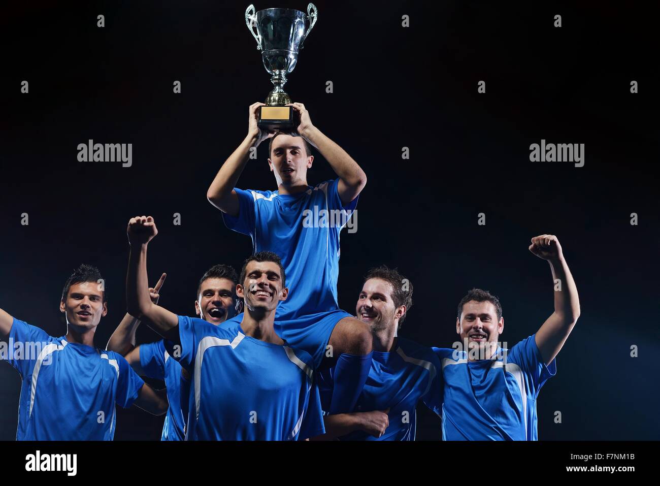 soccer players team group celebrating the victory and become champion ...