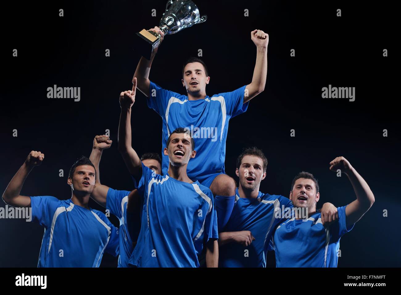 soccer players team group celebrating the victory and become champion ...