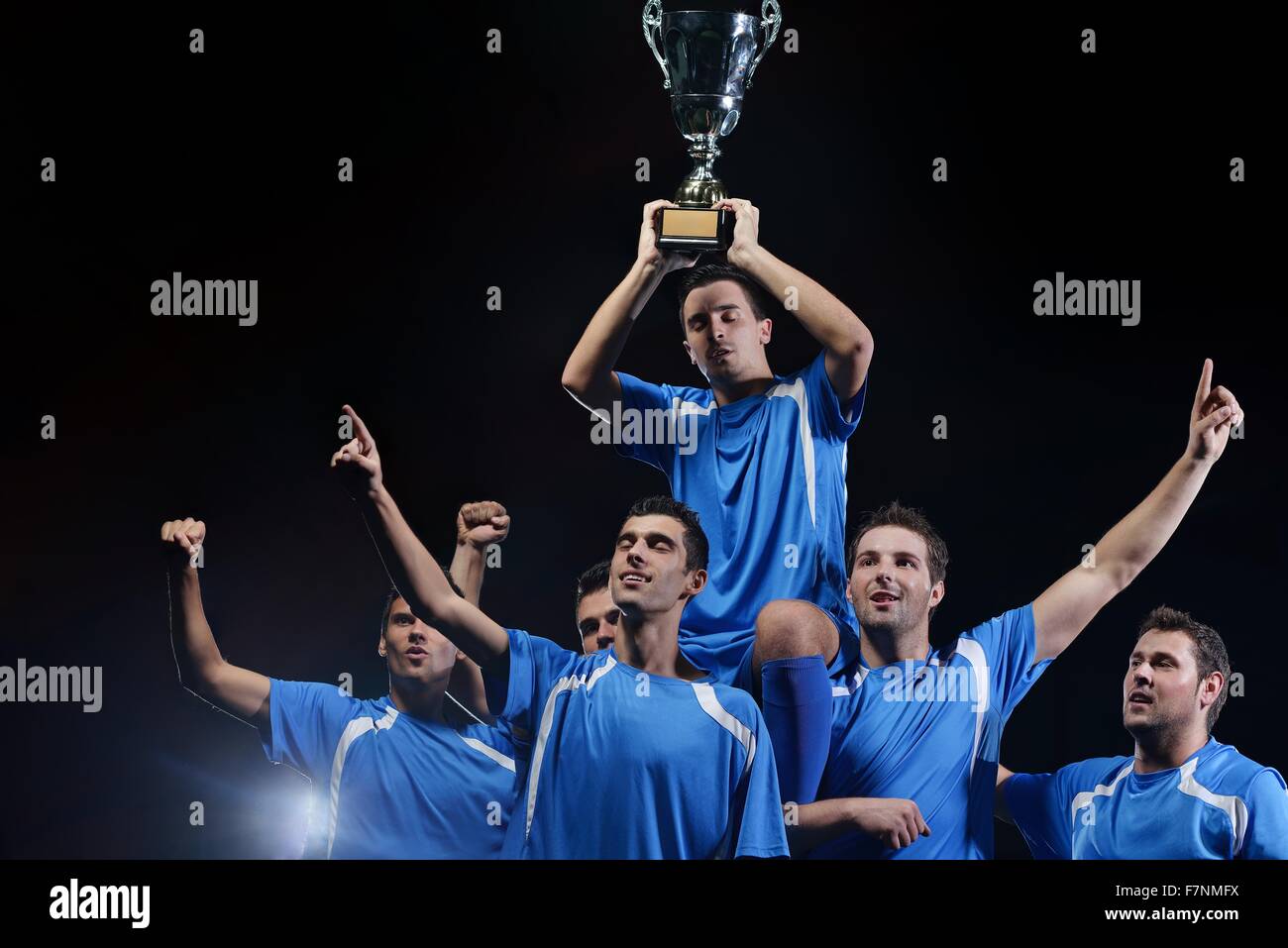 soccer players team group celebrating the victory and become champion ...