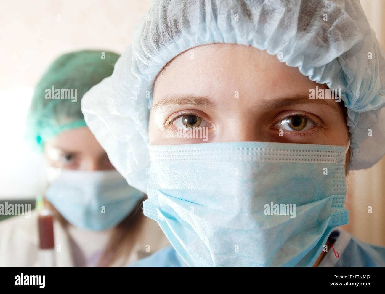two young doctors in mask at clinic Stock Photo - Alamy