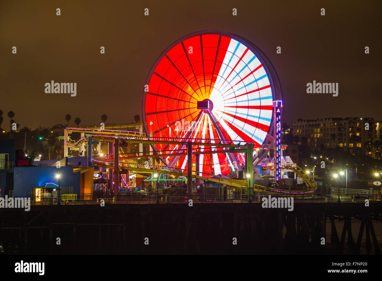 Illuminated ferris wheel at Santa Monica Pier, Los Angeles Stock Photo ...