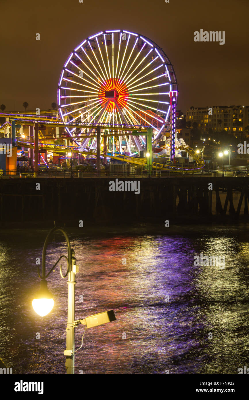 Illuminated ferris wheel at Santa Monica Pier, Los Angeles Stock Photo ...