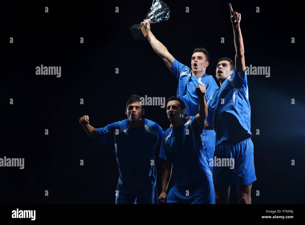 soccer players team group celebrating the victory and become champion ...