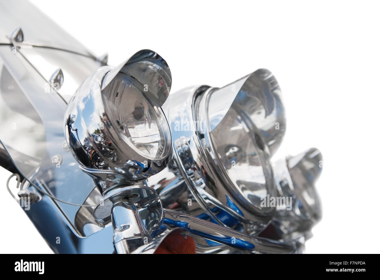 shiny headlight of big motorcycle. Isolated over white Stock Photo - Alamy