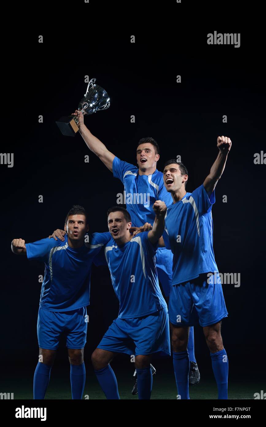 soccer players team group celebrating the victory and become champion ...