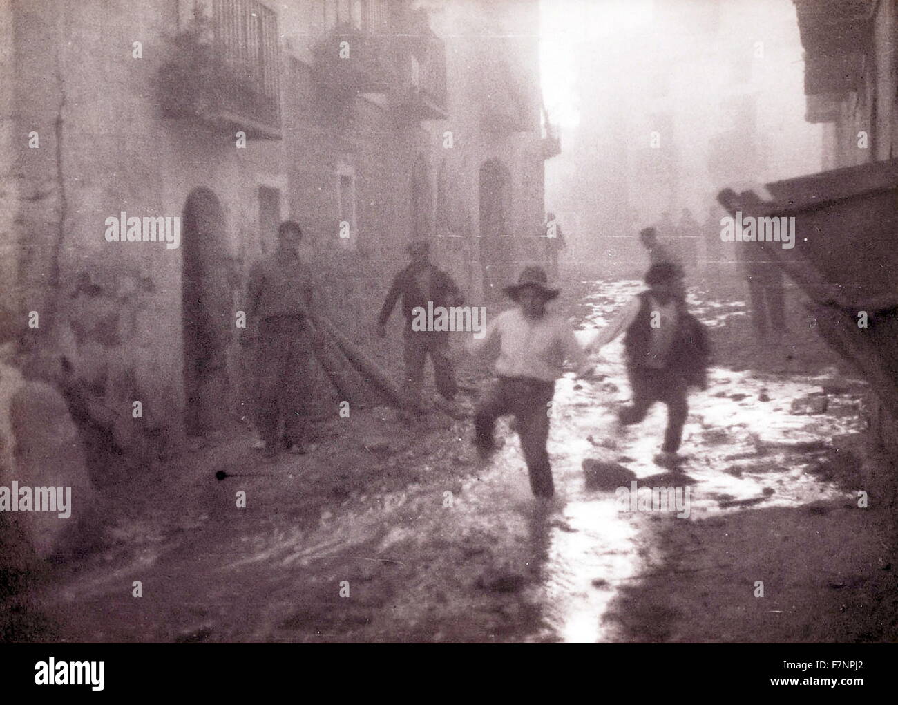 Civilians lee nationalist army shelling on Madrid, during the Spanish ...
